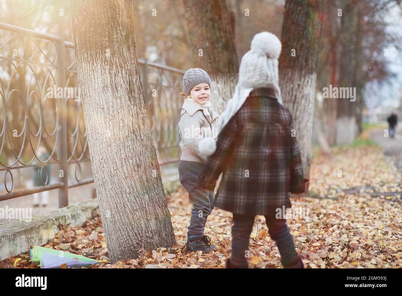 Children walk in the autumn park in the fall Stock Photo - Alamy