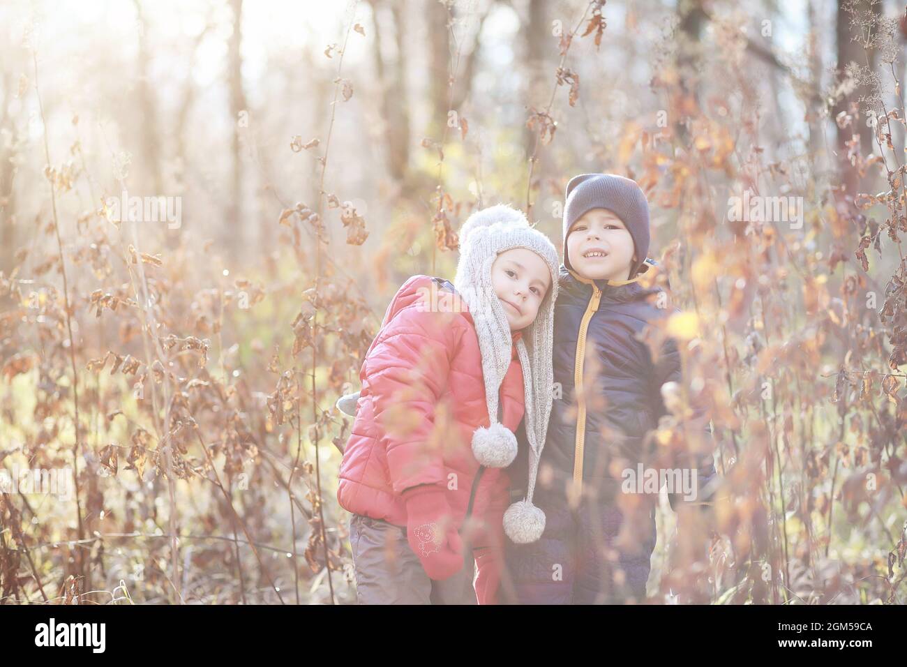 Children walk in the autumn park in the fall Stock Photo - Alamy