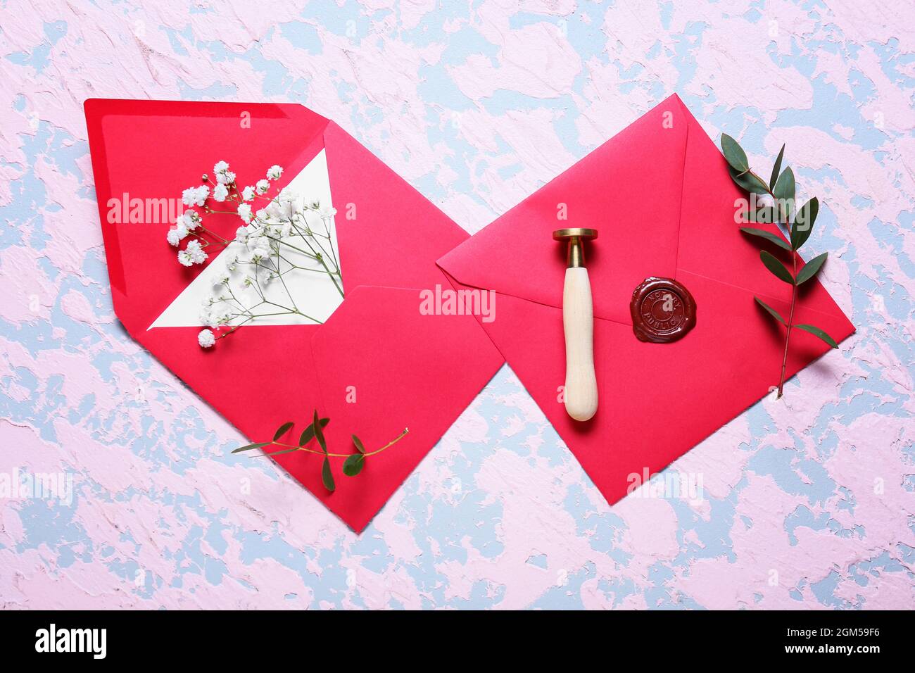Envelopes with flowers and stamp on grunge background Stock Photo - Alamy