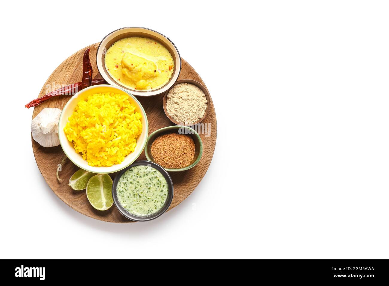 Tray with traditional Indian food and spices on white background Stock ...