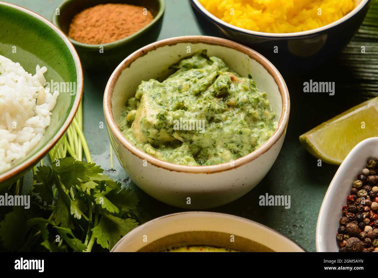 Traditional Indian food and spices on color background Stock Photo - Alamy