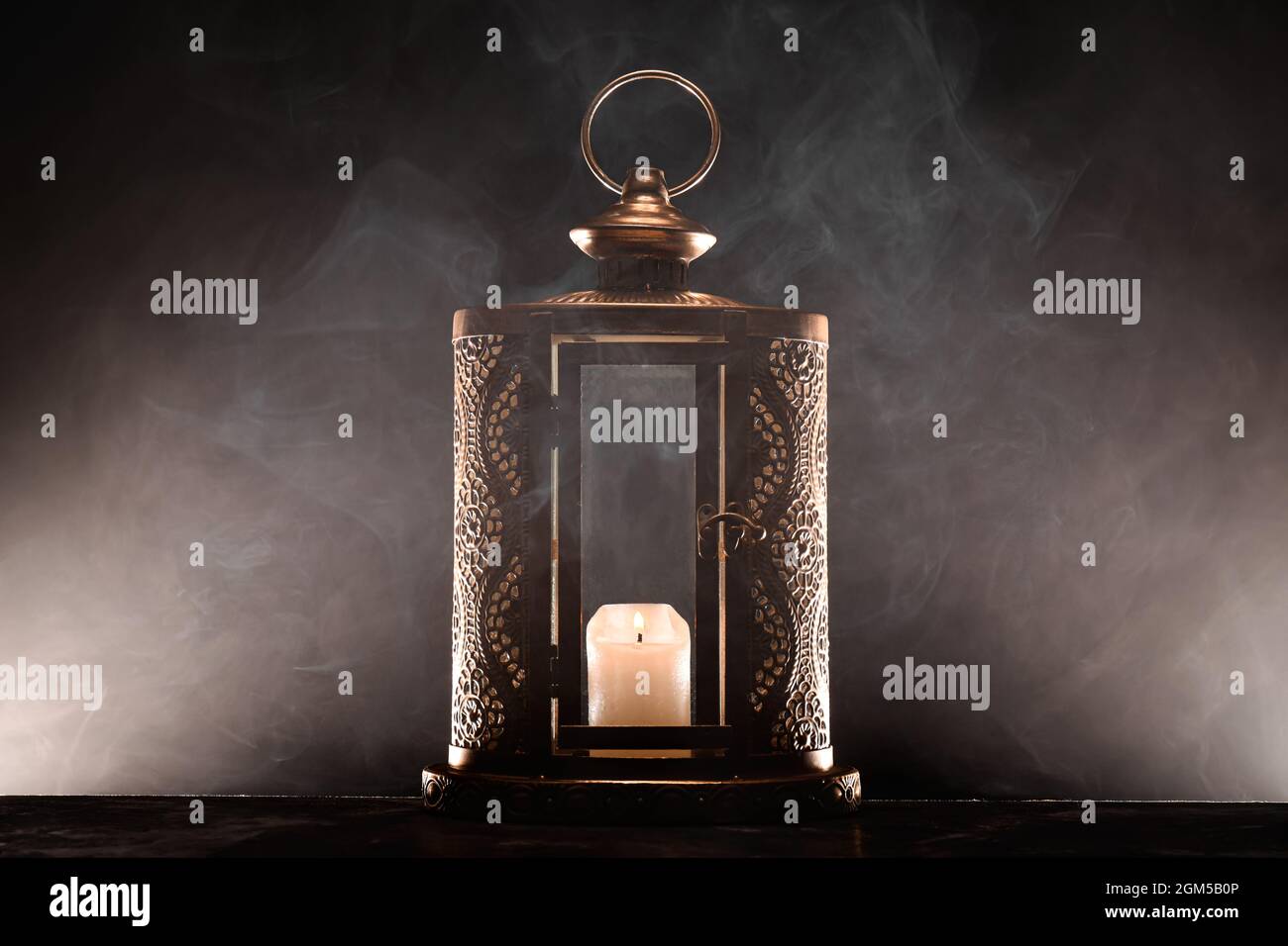 Islamic lamp on dark background Stock Photo - Alamy