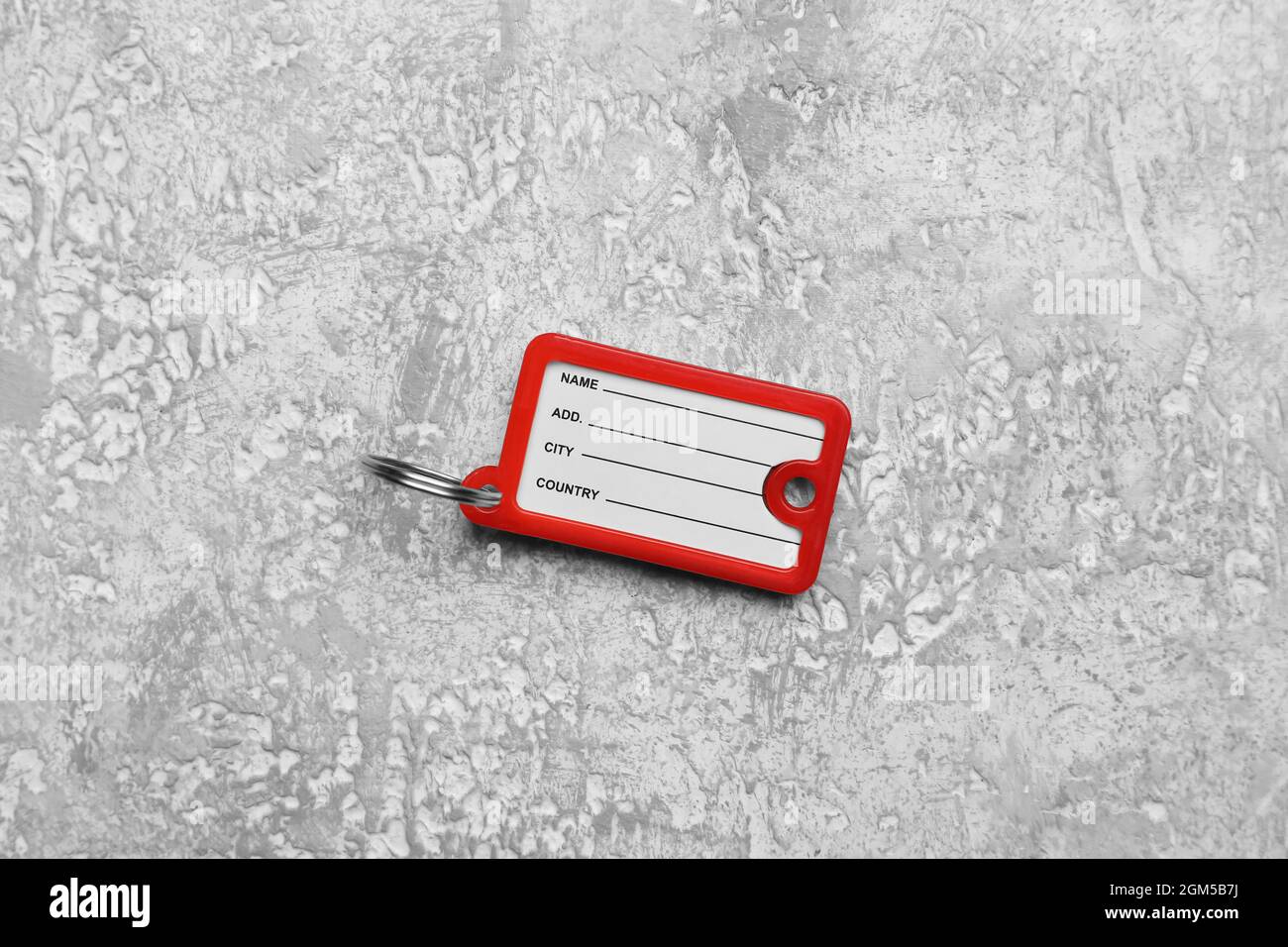 Red plastic key tag hi-res stock photography and images - Alamy