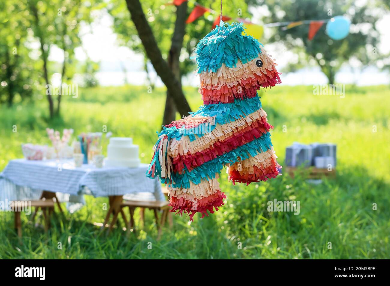 Colorful Mexican pinata hanging outdoors Stock Photo - Alamy