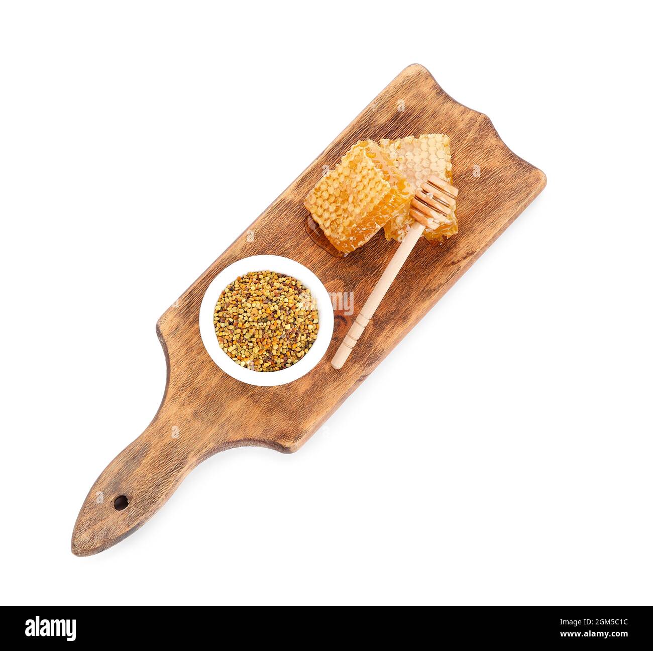 Bowl of bee pollen and honey combs on white background Stock Photo - Alamy