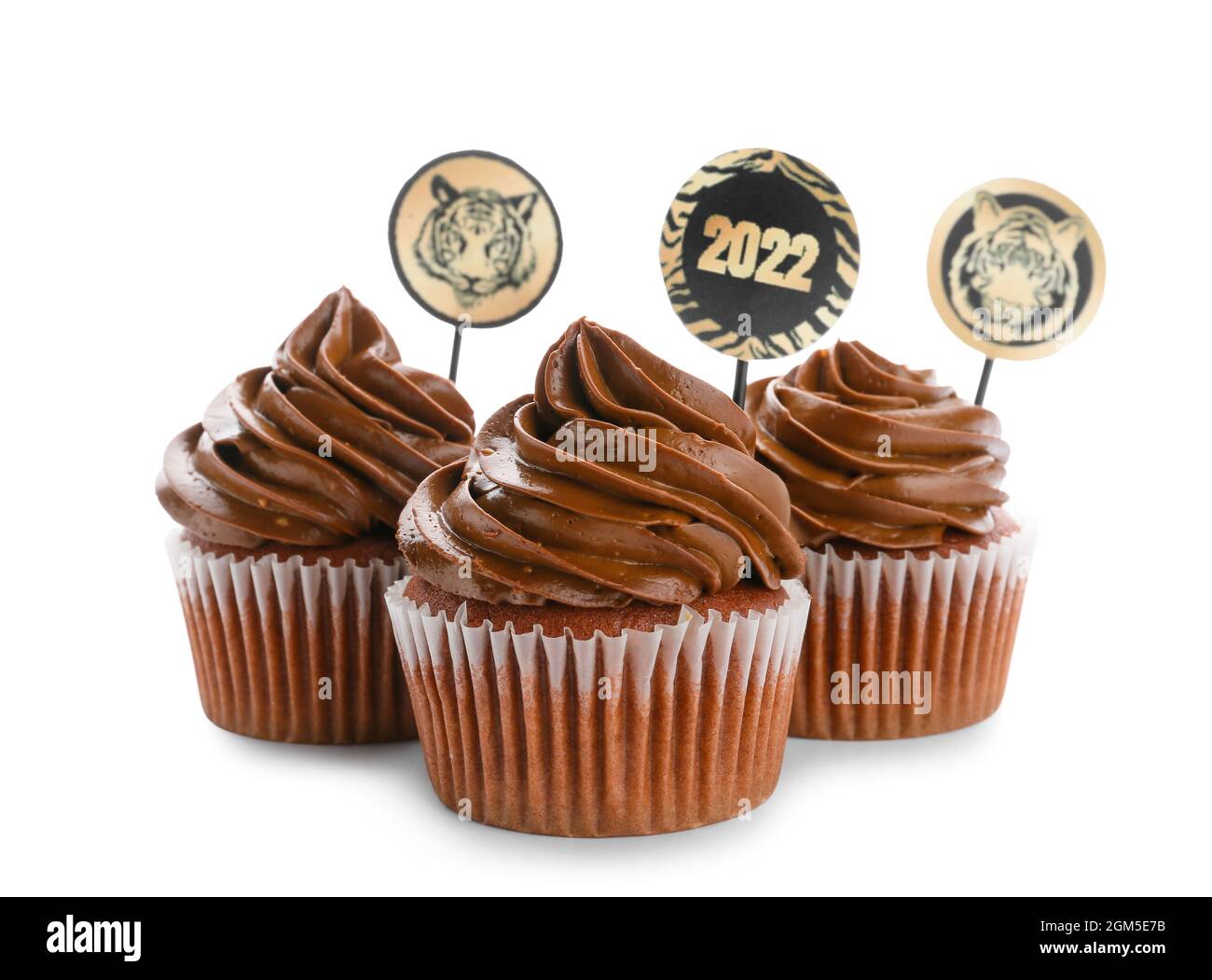 Tasty cupcakes for New Year 2022 celebration on white background Stock ...