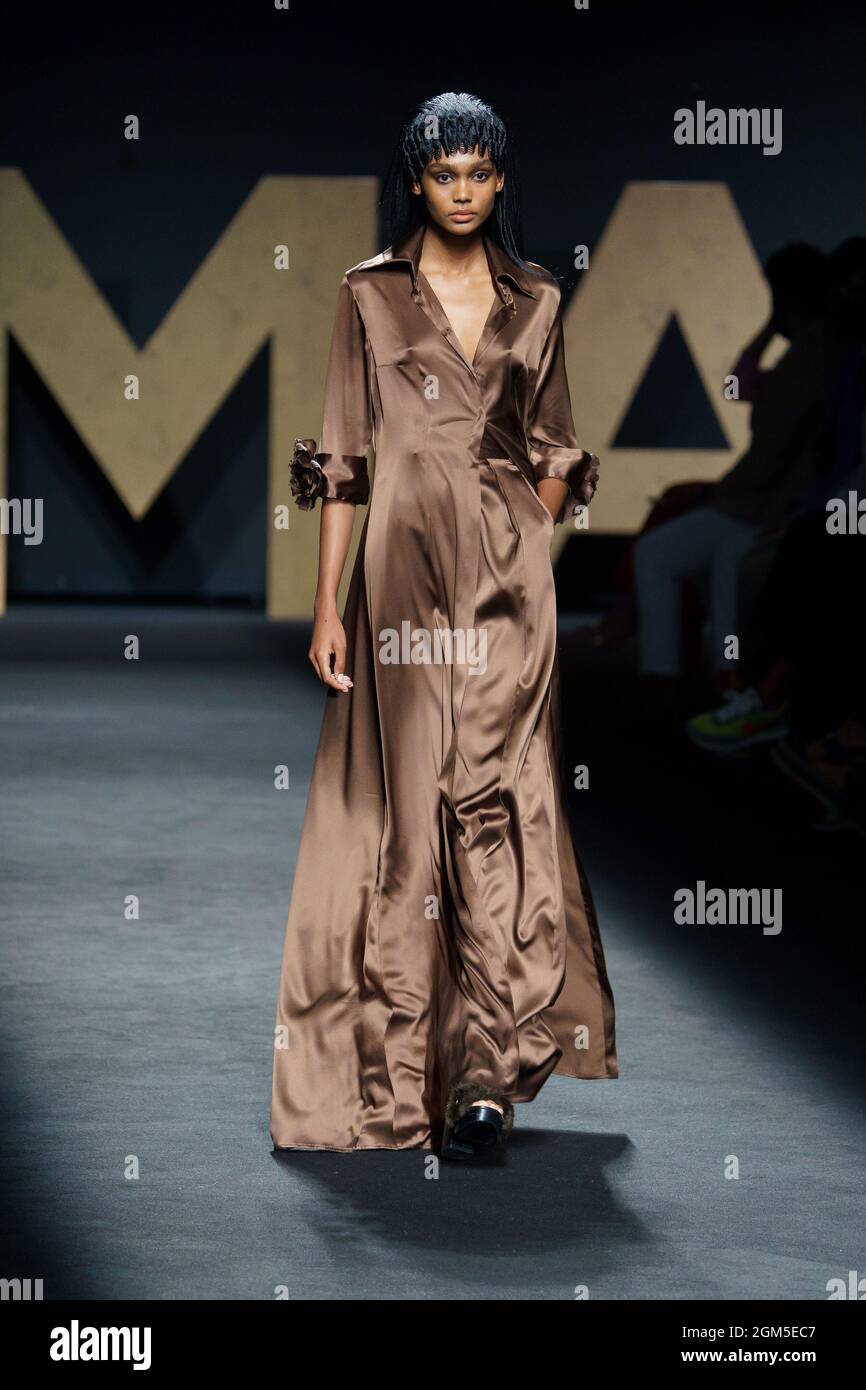 A model walks the runway at the Malne fashion show during Mercedes Benz ...