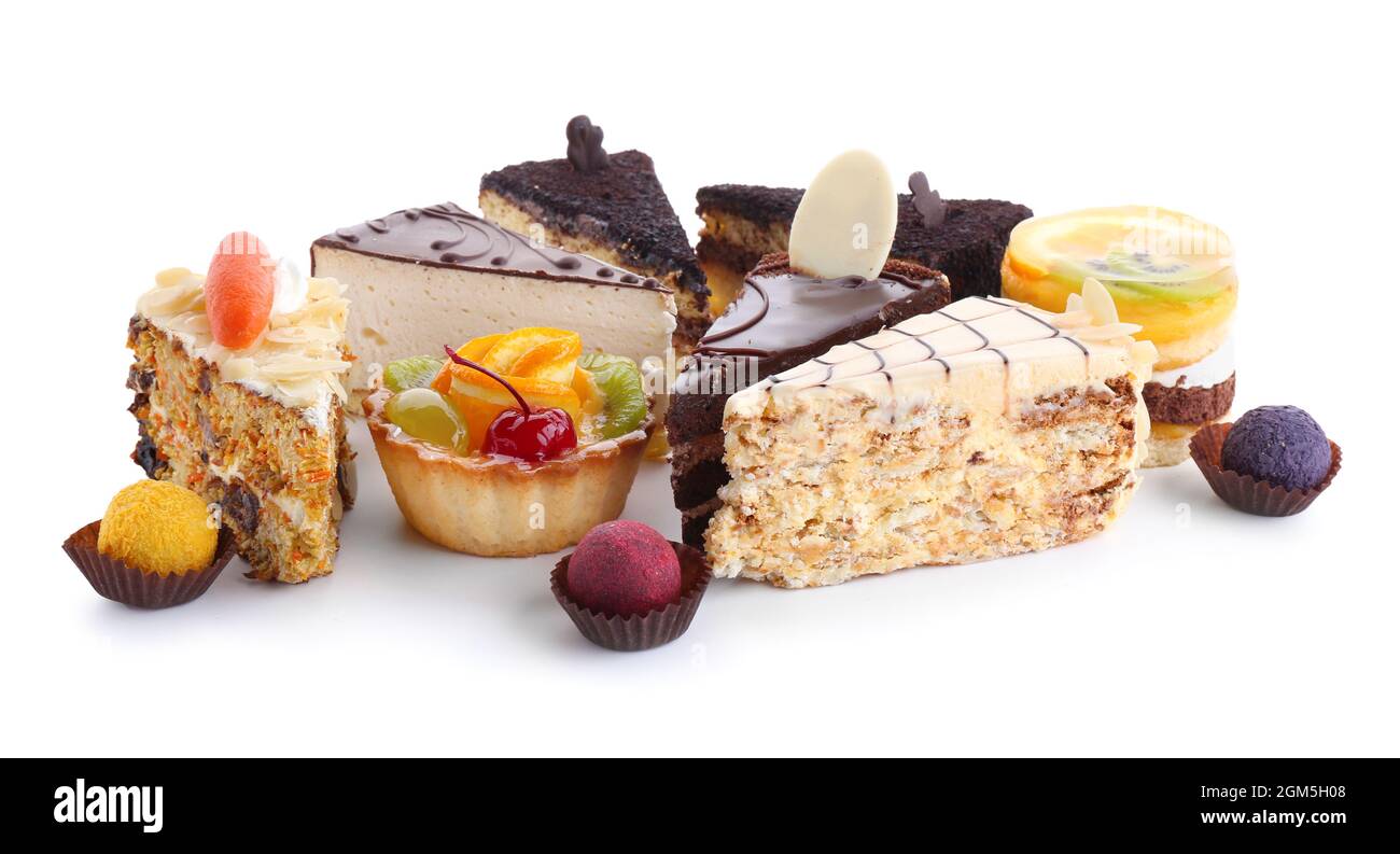 Variety of tasty sweets on white background Stock Photo - Alamy