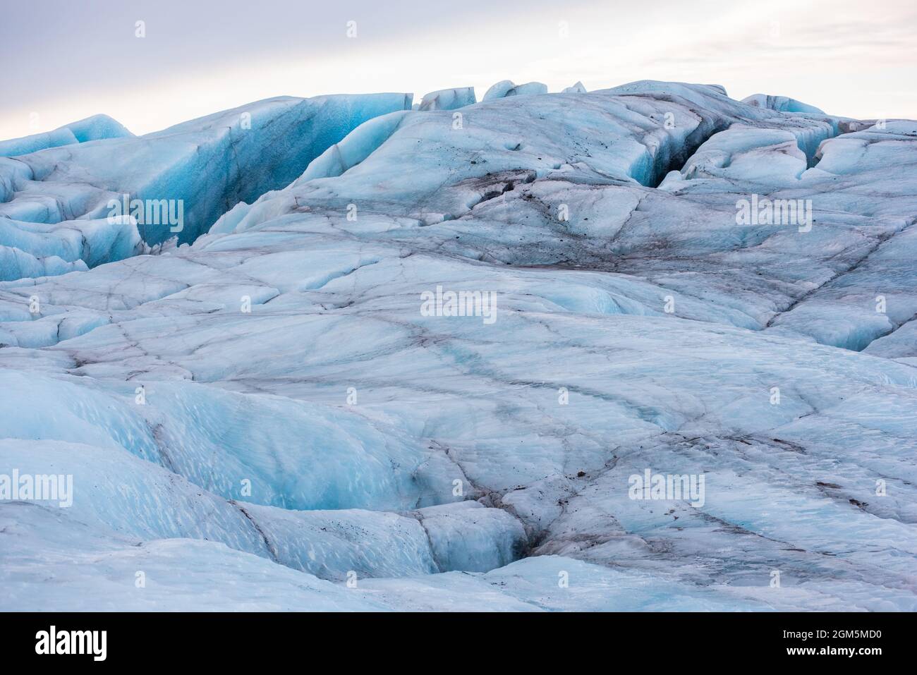 Close up of glacier with volcanic ash and blue ice Stock Photo - Alamy