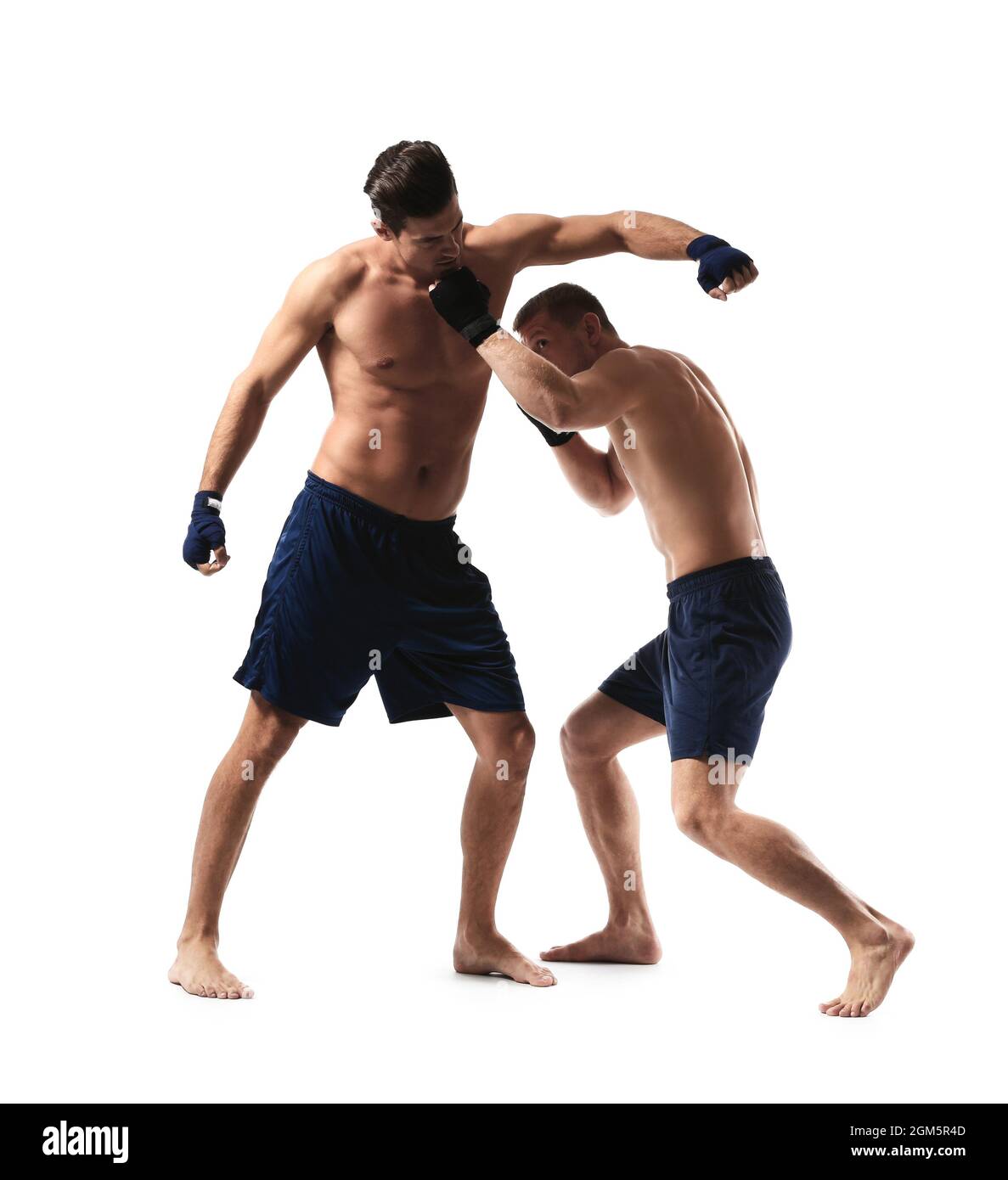 Attractive young boxers fighting on white background Stock Photo - Alamy