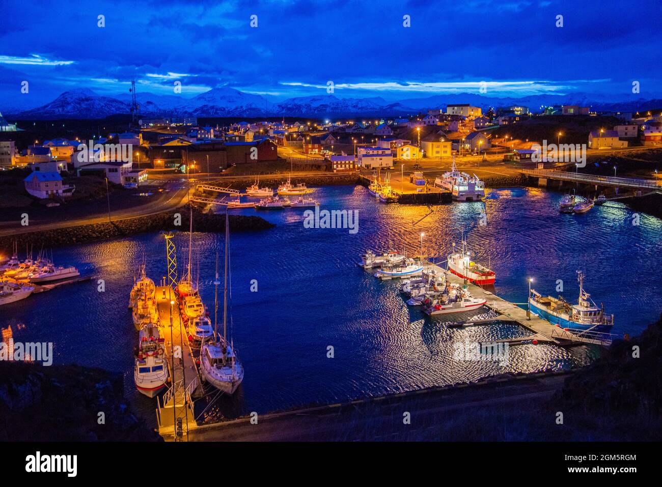 Iceland marina sunset with vibrant blue and yellow mood lighting Stock ...