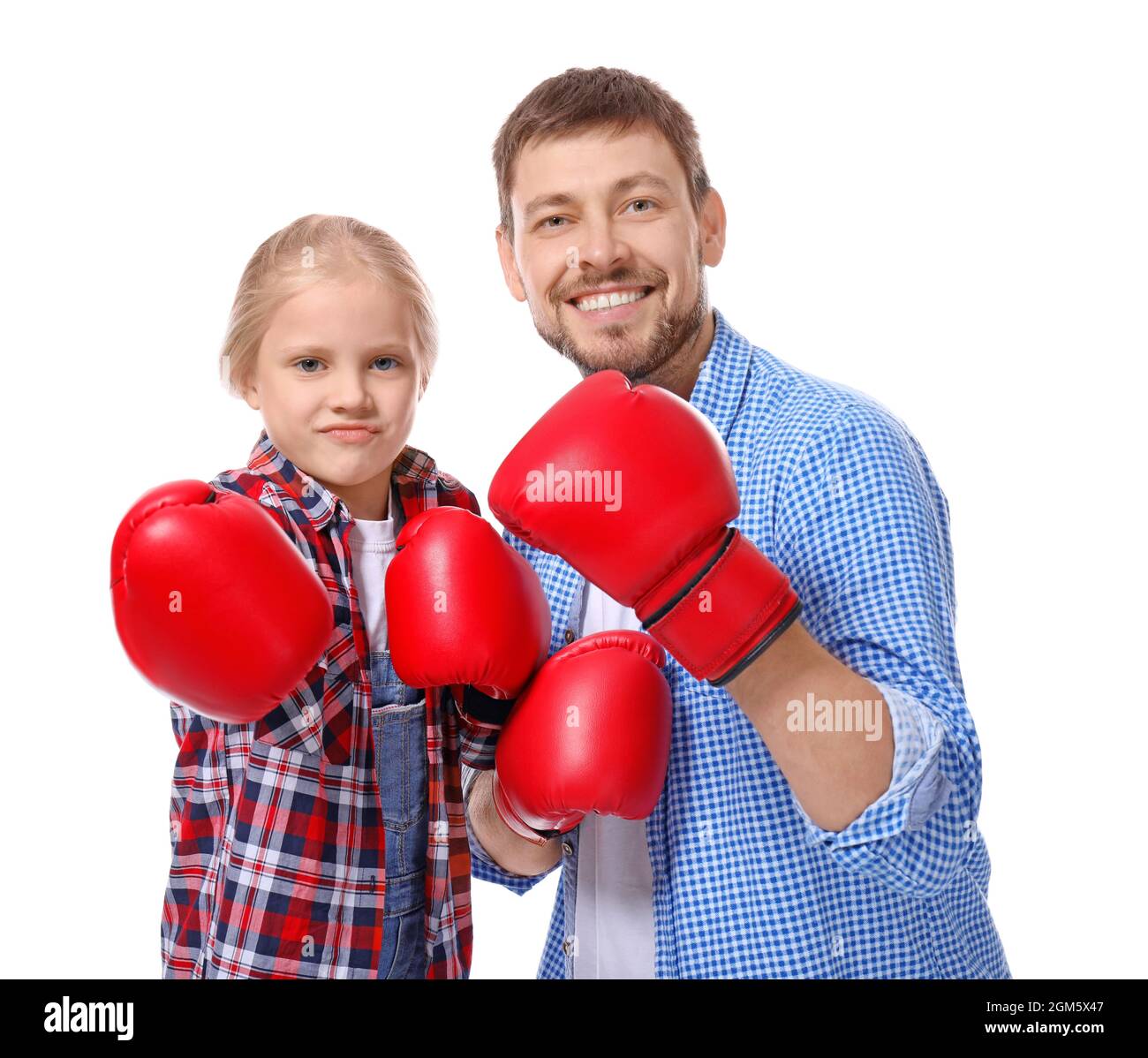 Cute little girl and her father in boxing gloves on white background ...