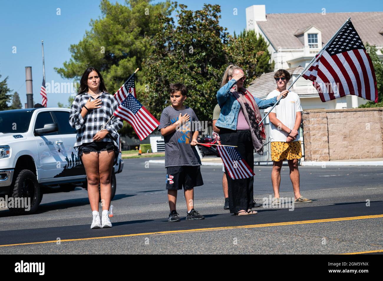 Young spectators along the procession route for fallen Marine Sgt ...