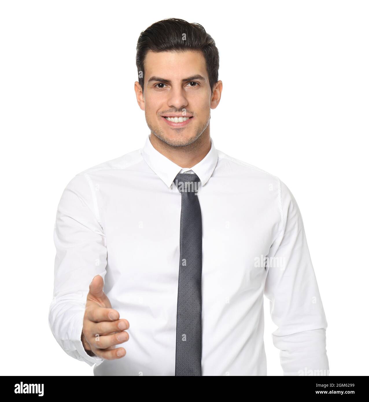 Man in formal clothes reaching out for handshake on white background ...