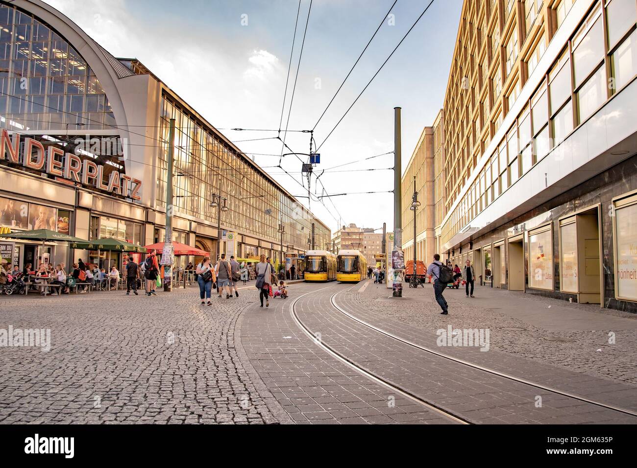 People walking at Alexanderplatz which is a large public square and ...