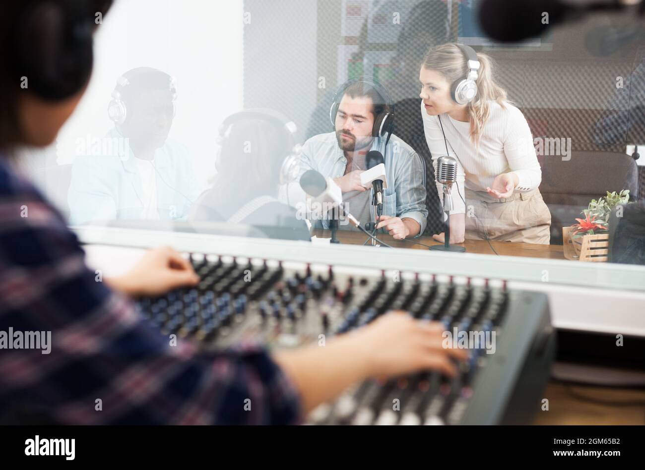 Presenters in live radio show Stock Photo - Alamy