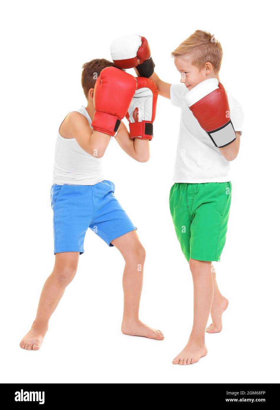 Cute little boys boxing on white background Stock Photo - Alamy