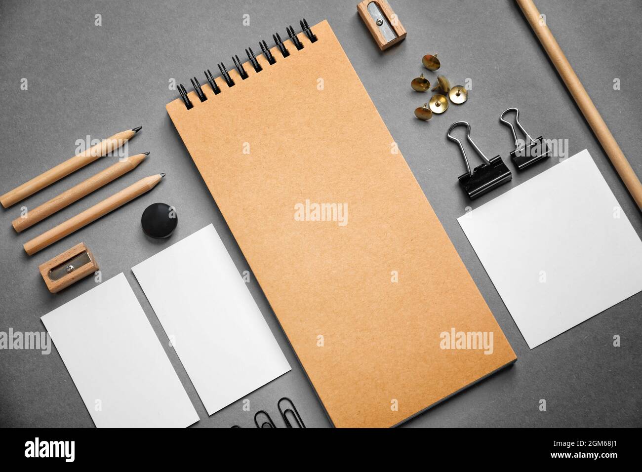 Blank items as mockups for branding on grey background Stock Photo - Alamy