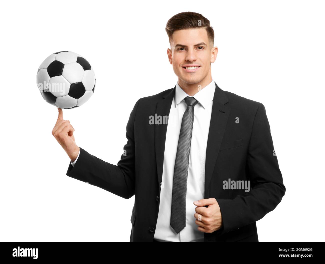 Handsome manager with soccer ball on white background Stock Photo - Alamy