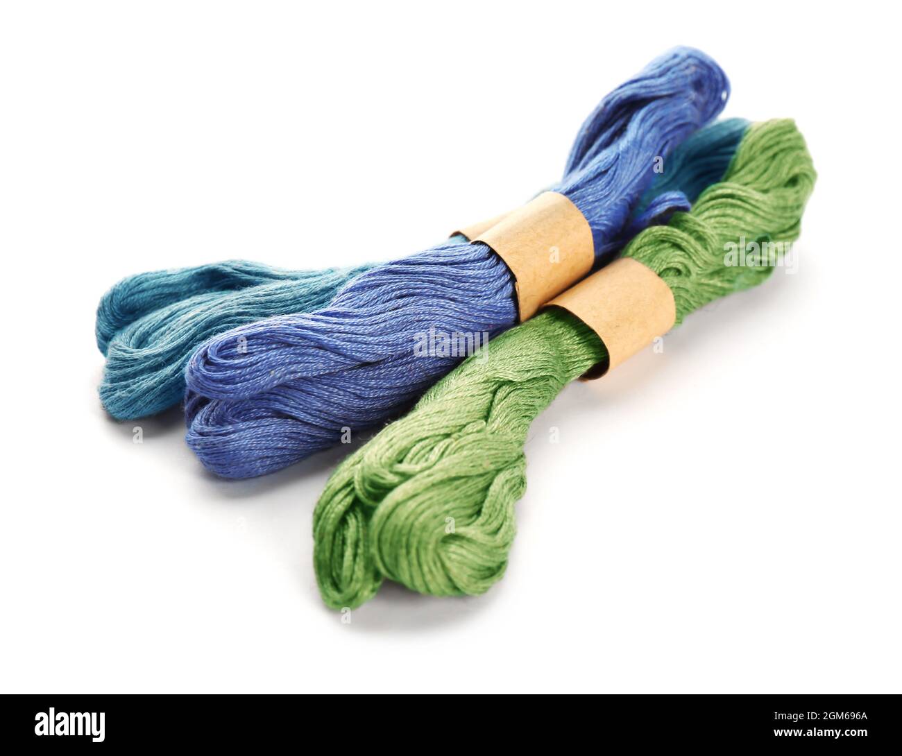 Colorful embroidery threads on white background Stock Photo - Alamy