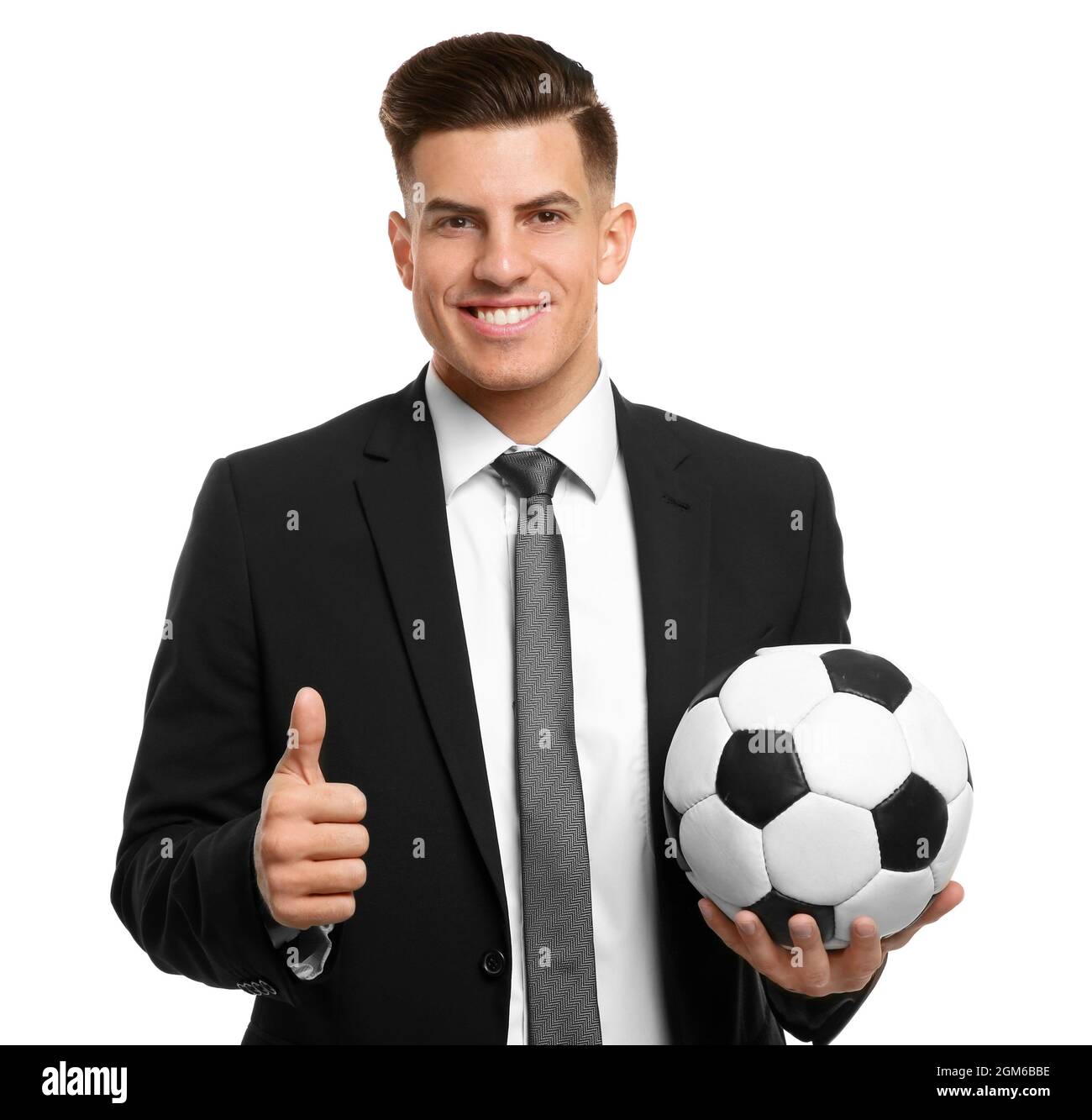 Handsome manager with soccer ball on white background Stock Photo - Alamy