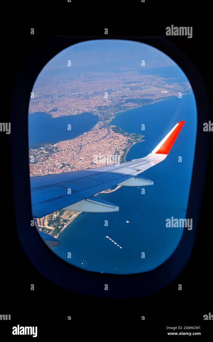 Looking through window aircraft during flight in wing lands over ...