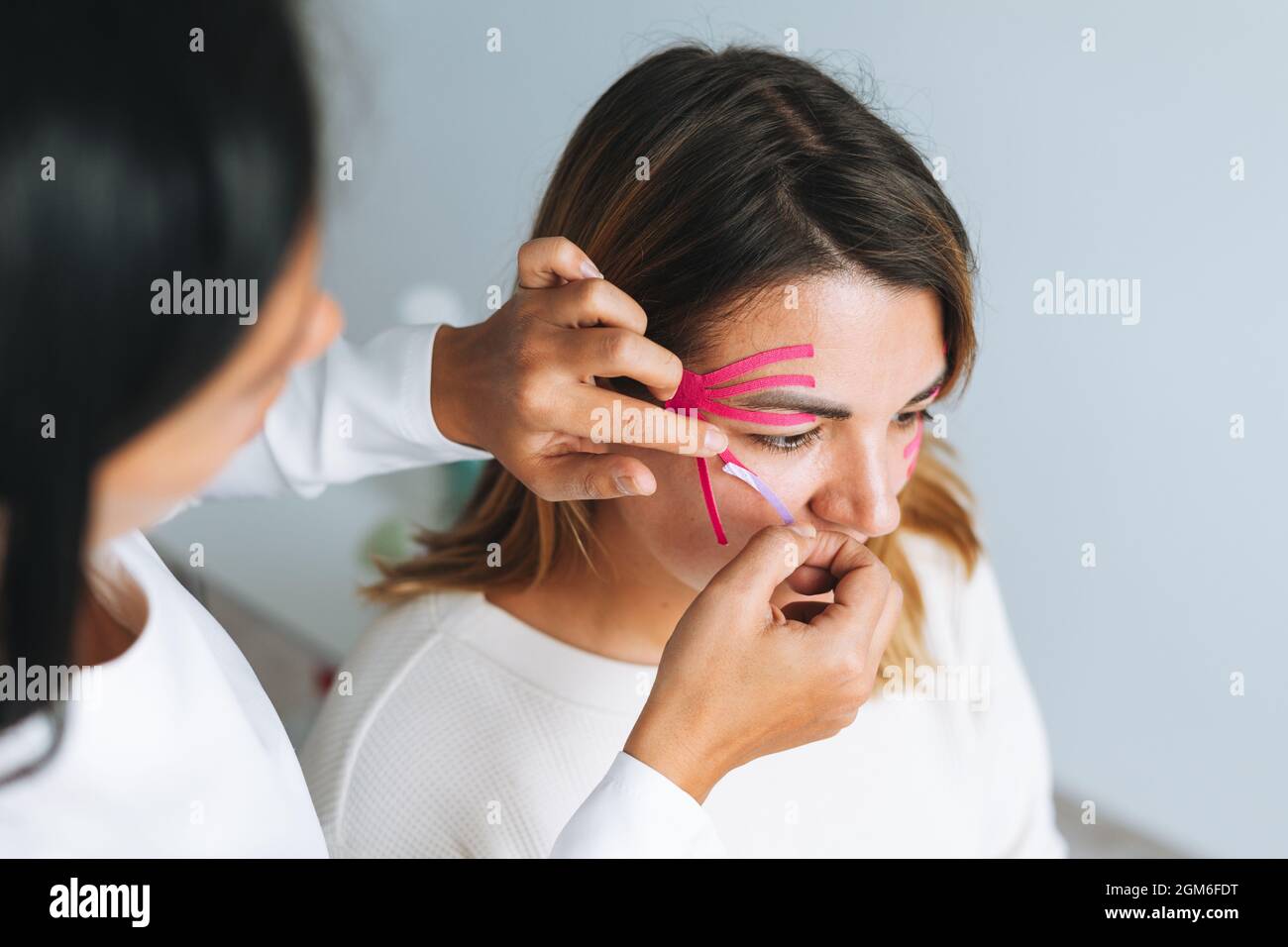 Face taping hi-res stock photography and images - Alamy