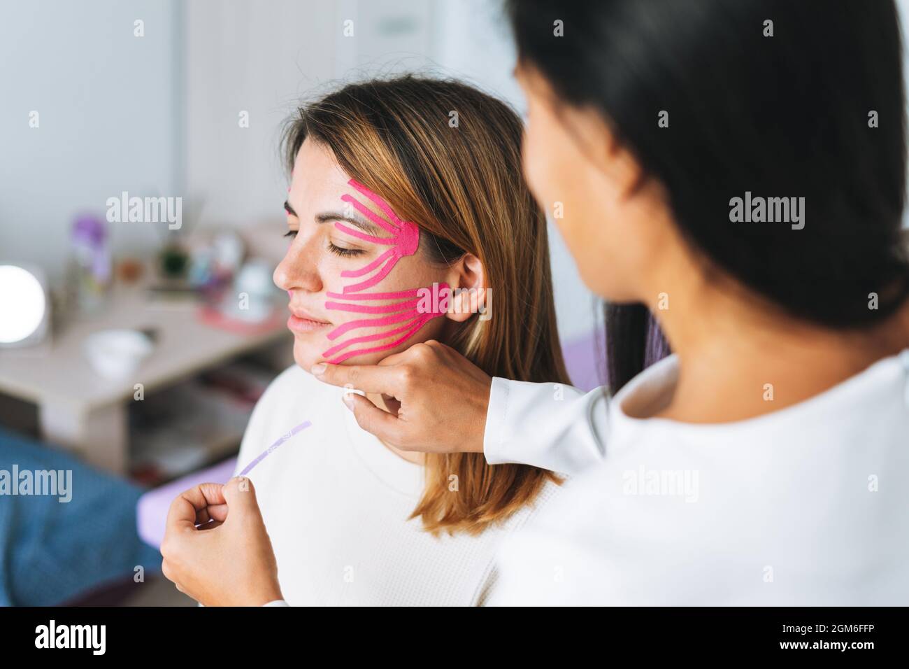 Face taping hi-res stock photography and images - Alamy