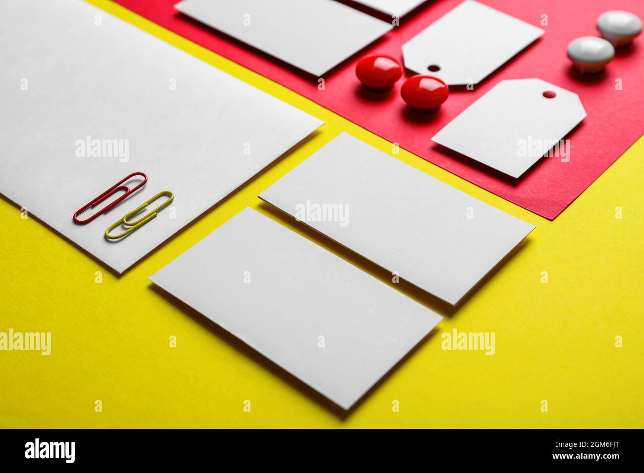 Blank items as mockups for branding on color background Stock Photo - Alamy