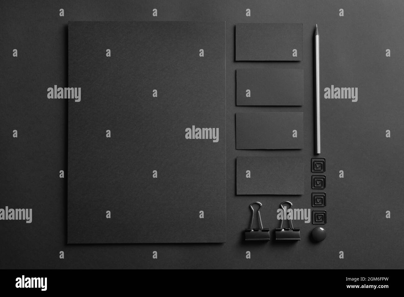 Blank items as mockups for branding on dark background Stock Photo - Alamy