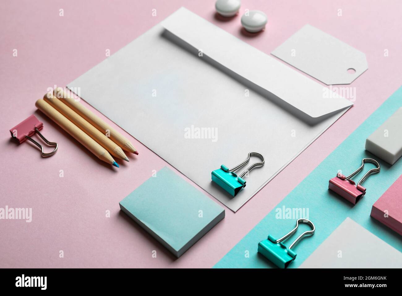 Blank items as mockups for branding on color background Stock Photo - Alamy