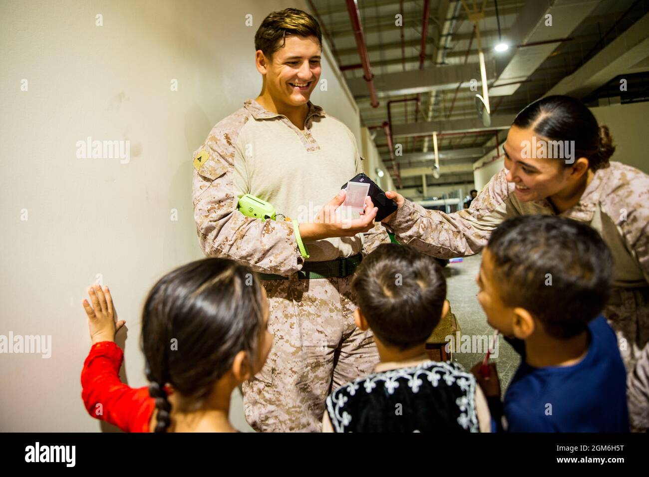U.S. Marine Corps Lance Cpl. Kellen Medina, left, and 2nd Lt. Stephanie ...