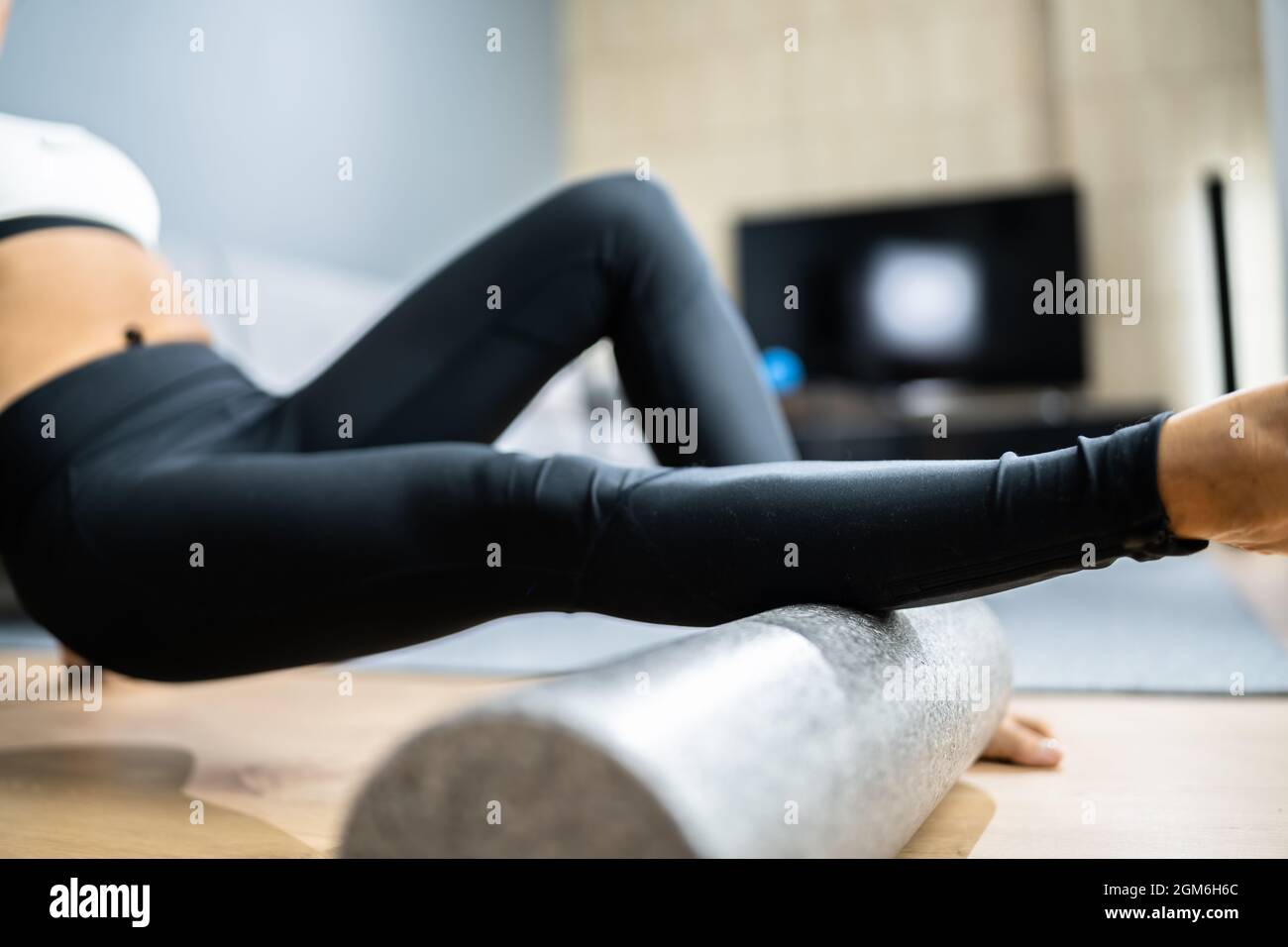 Foam Roller Healthy Leg Workout Sport Training On Floor Stock Photo - Alamy