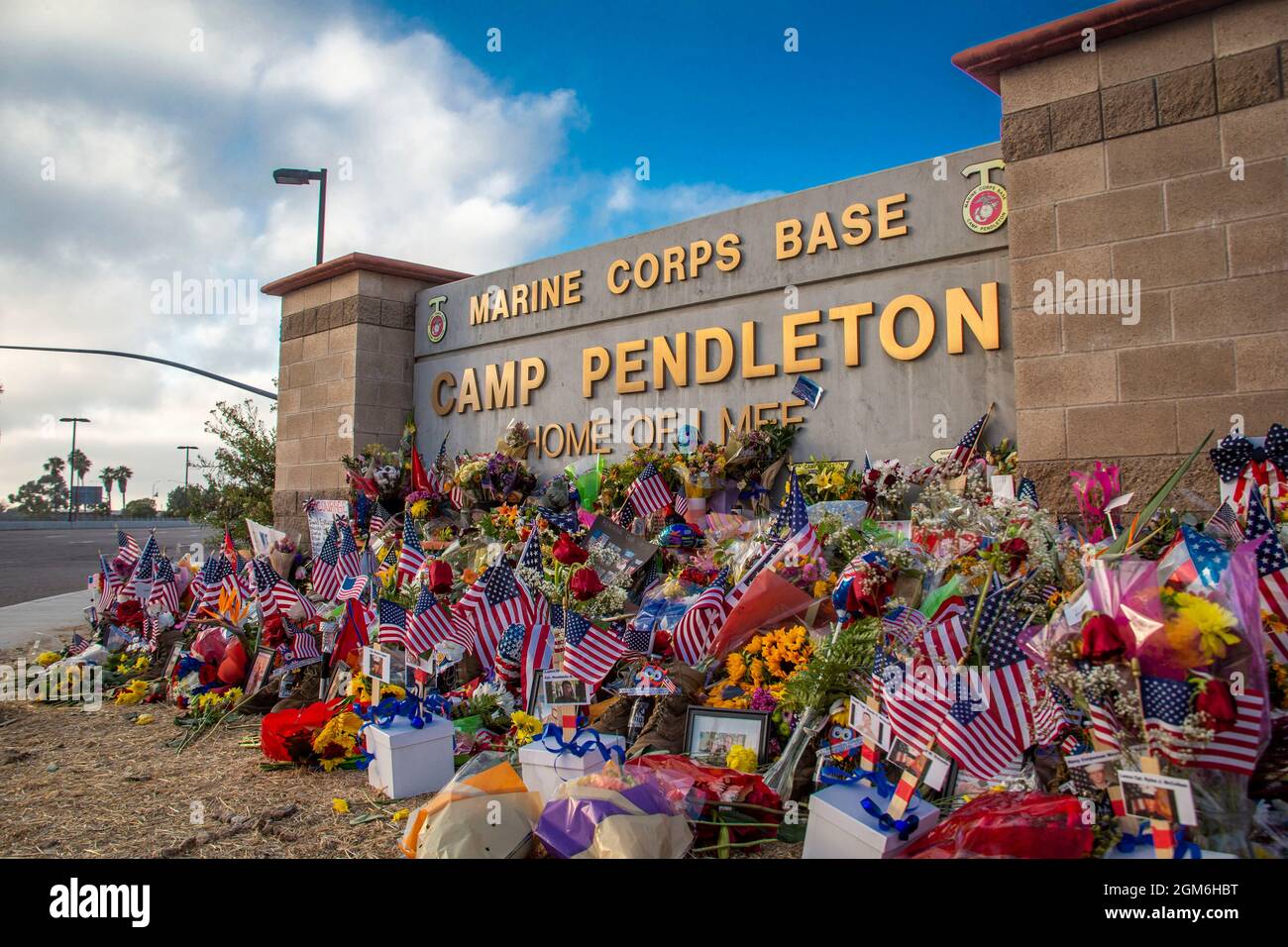 Flowers, flags and messages in remembrance of fallen U.S. service ...