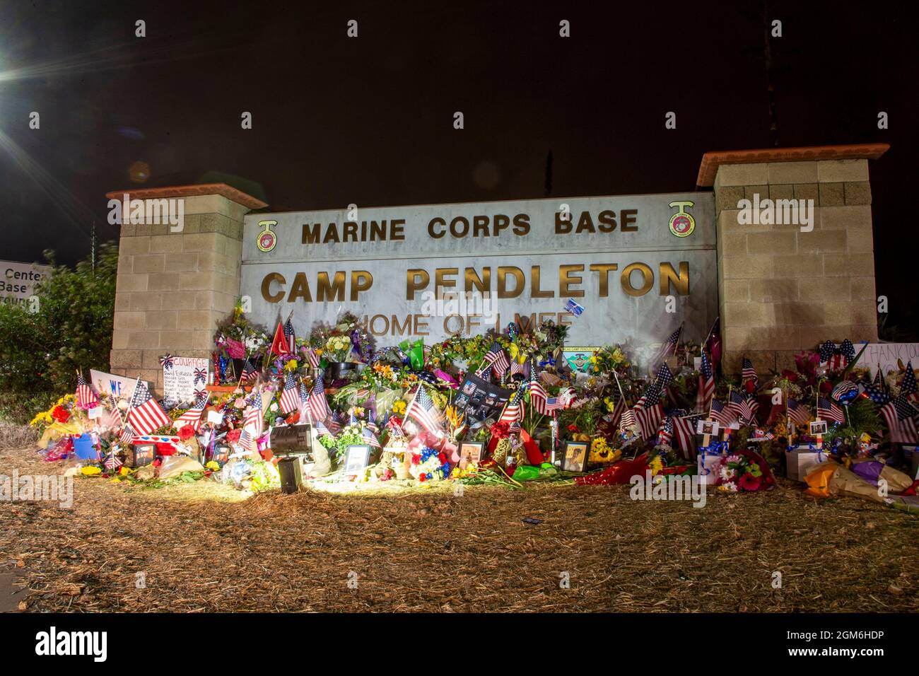 Flowers, flags and messages in remembrance of fallen U.S. service ...