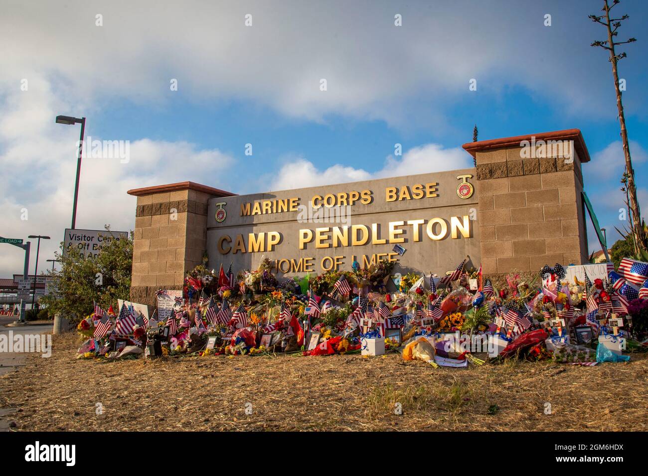 Flowers, flags and messages in remembrance of fallen U.S. service ...