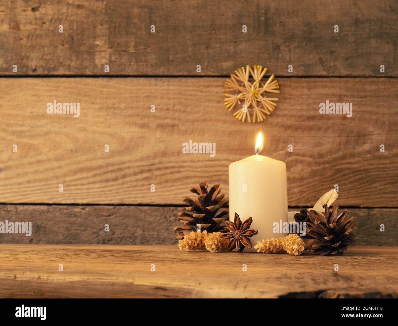 One golden burning advent candle hi-res stock photography and images ...