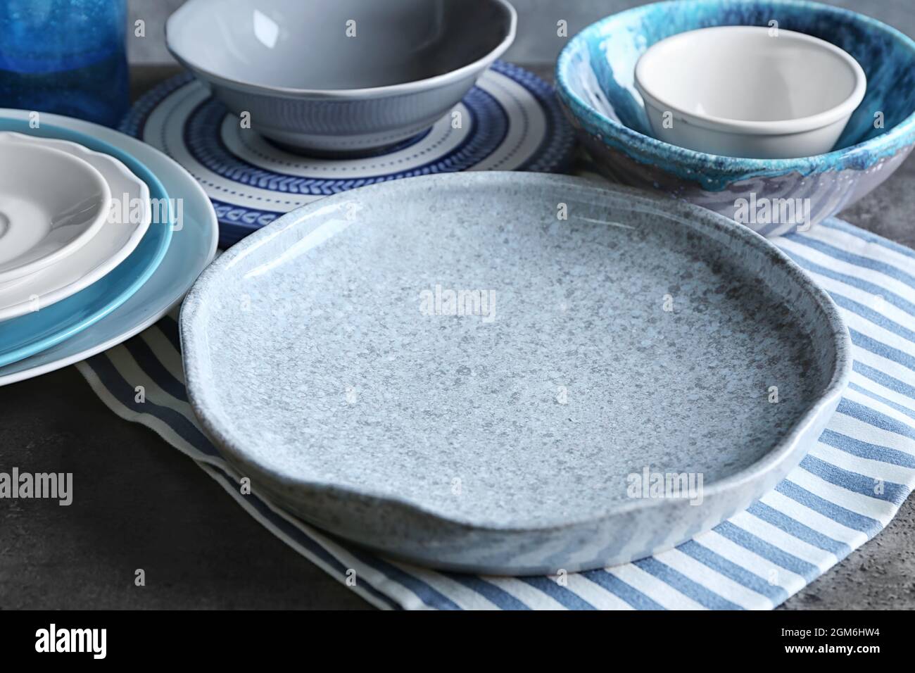 Set of dishware on table Stock Photo - Alamy