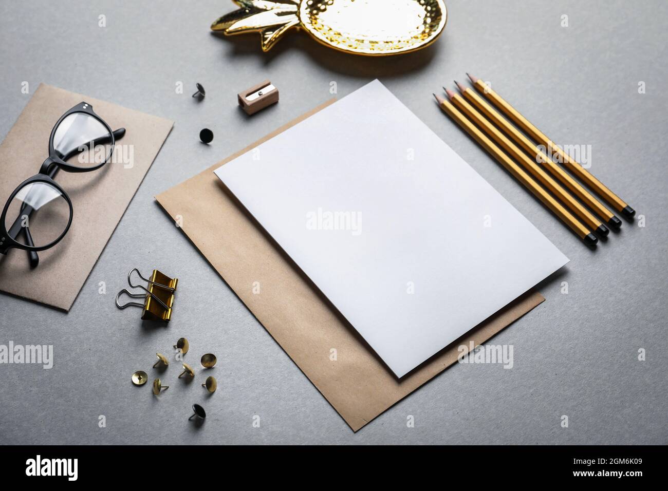 Blank items as mockups for branding on grey background Stock Photo - Alamy