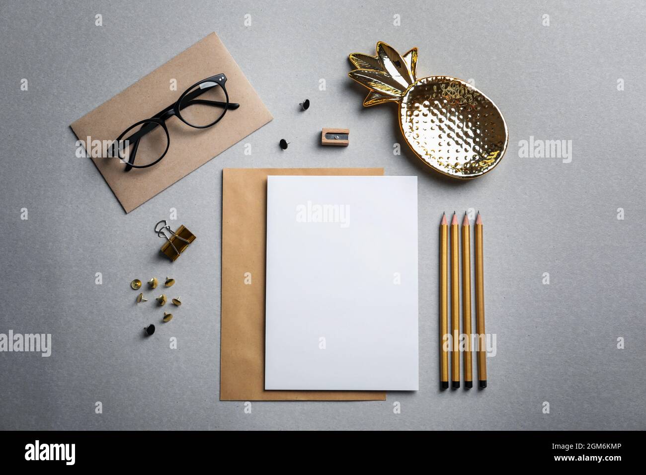 Blank items as mockups for branding on grey background Stock Photo - Alamy