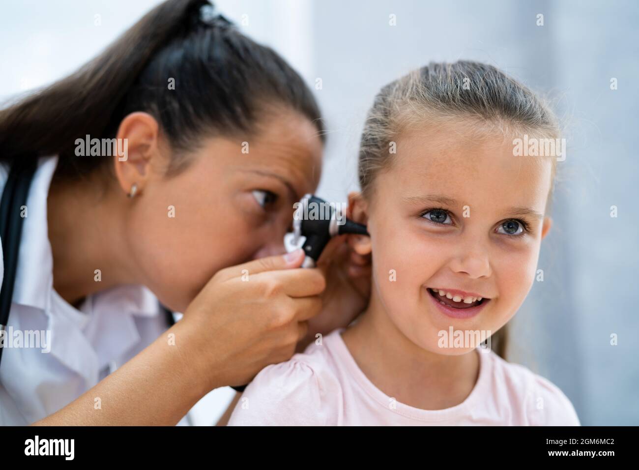 Otolaryngology Infection. Child Doctor Checking Ear Using Otoscope ...