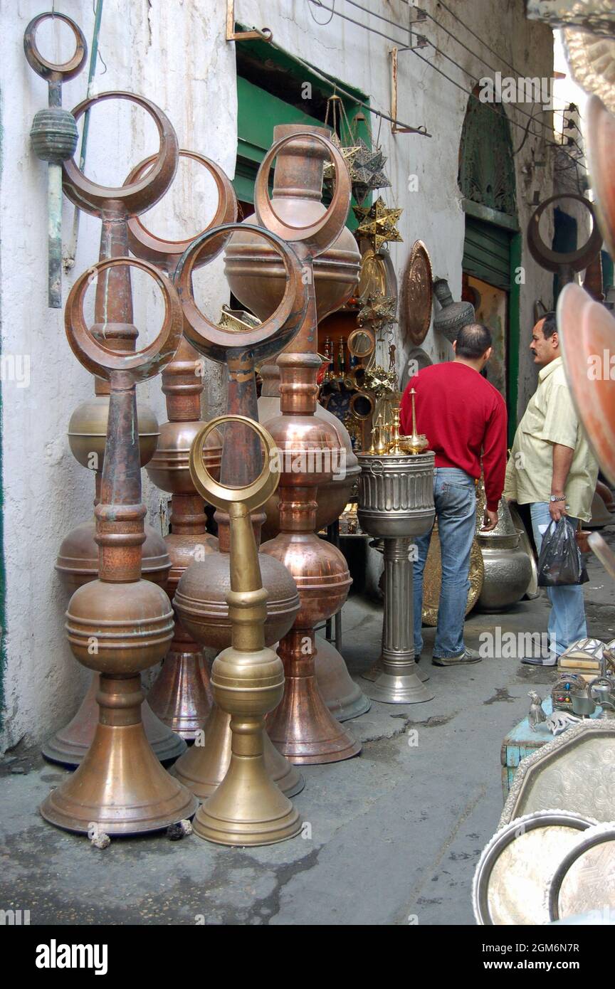 Tripoli, Libya - April 4, 2006: Two men looking at the crafts on ...