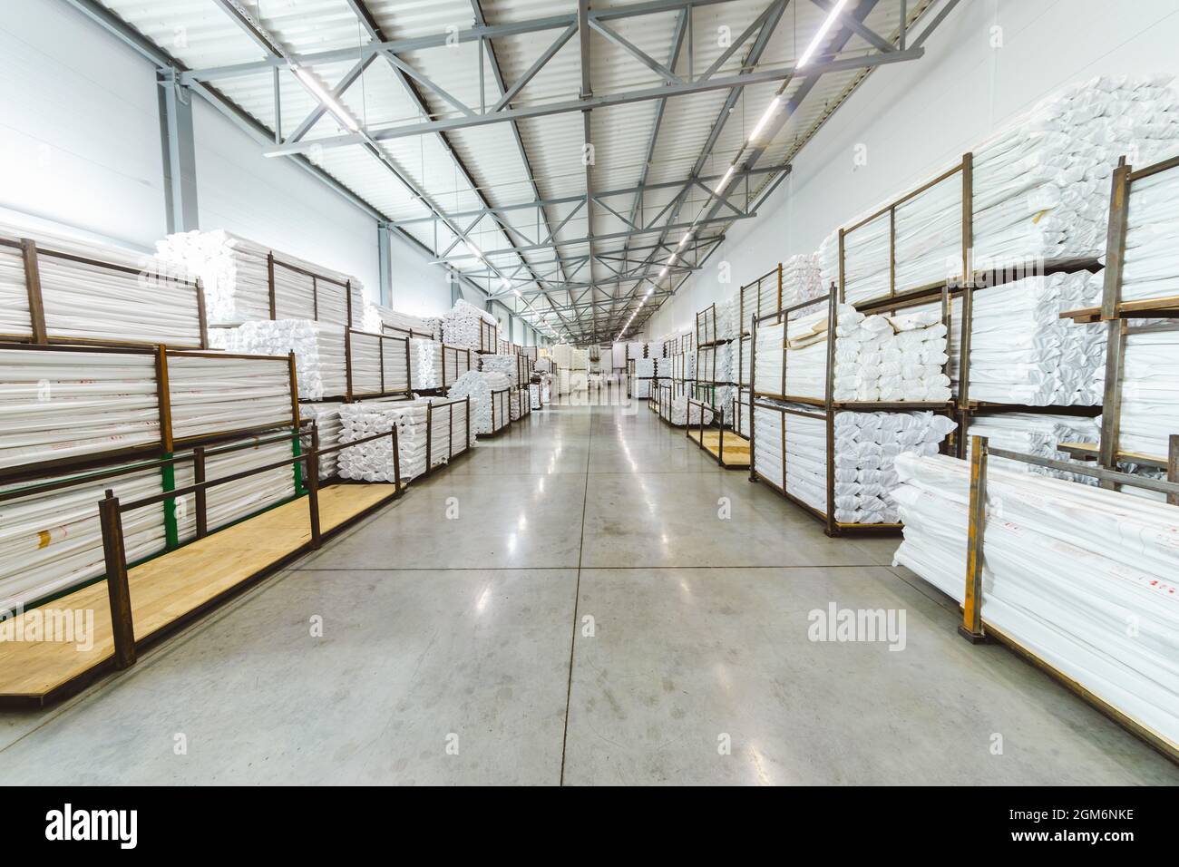 Spacious light interior of a large warehouse in a factory with special ...