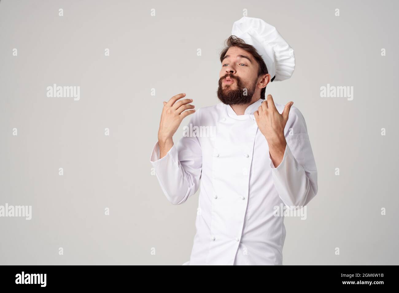 male cook kitchen Job hand gestures isolated background Stock Photo - Alamy
