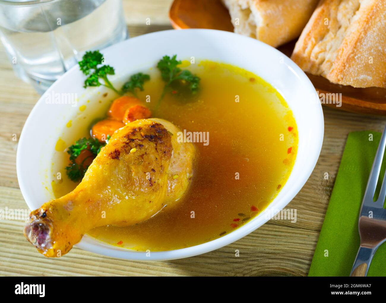 Bowl of homemade chicken bouillon Stock Photo - Alamy
