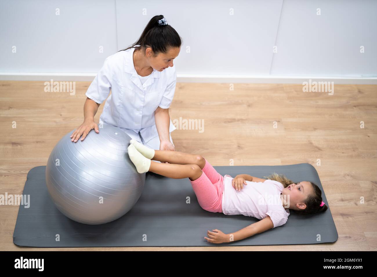 Balance Training Physiotherapy Exercise Treatment For Child. Kid Sport ...