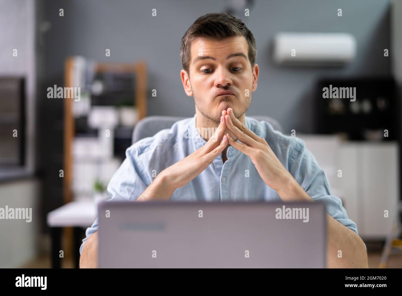 Male professional pondering hi-res stock photography and images - Alamy