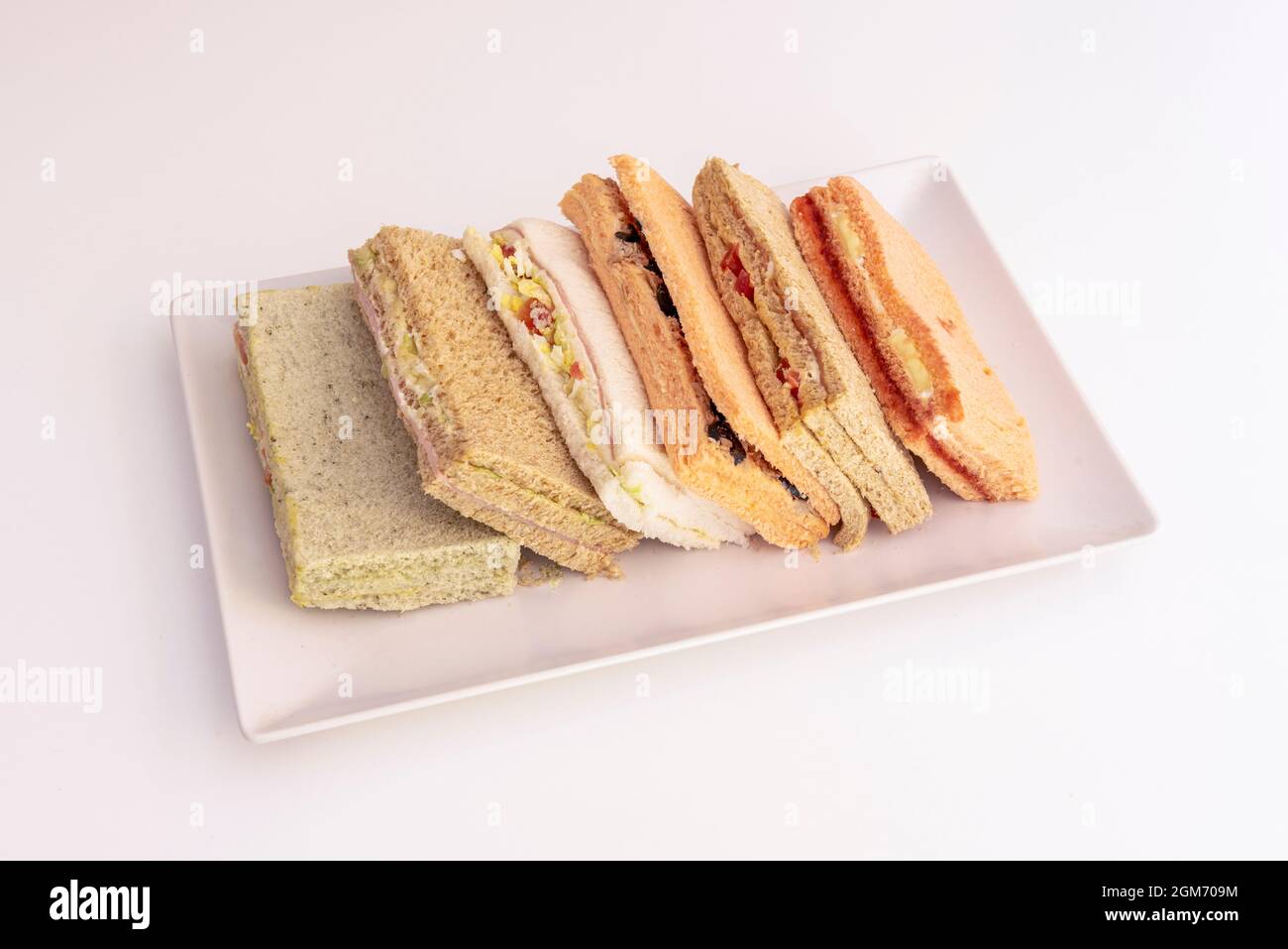 sandwich of assorted sliced breads with fillings to choose from on a ...