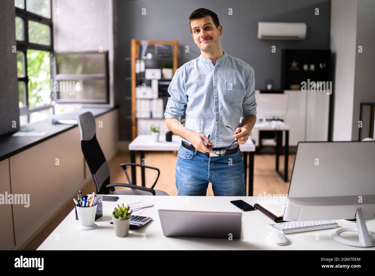 Business owner in office hi-res stock photography and images - Alamy