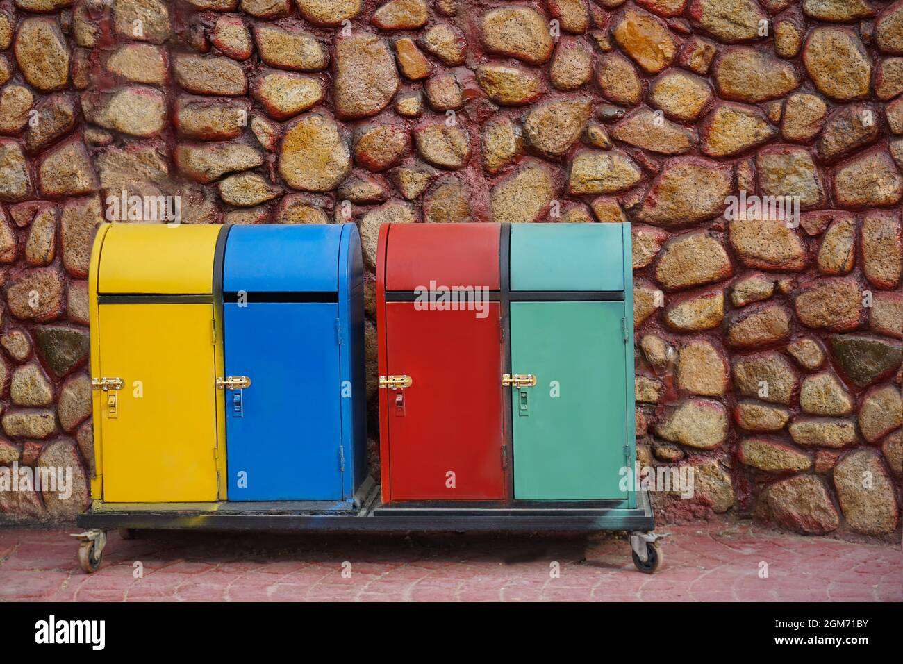 Different colorful trash bins outdoors. Recycling concept Stock Photo ...